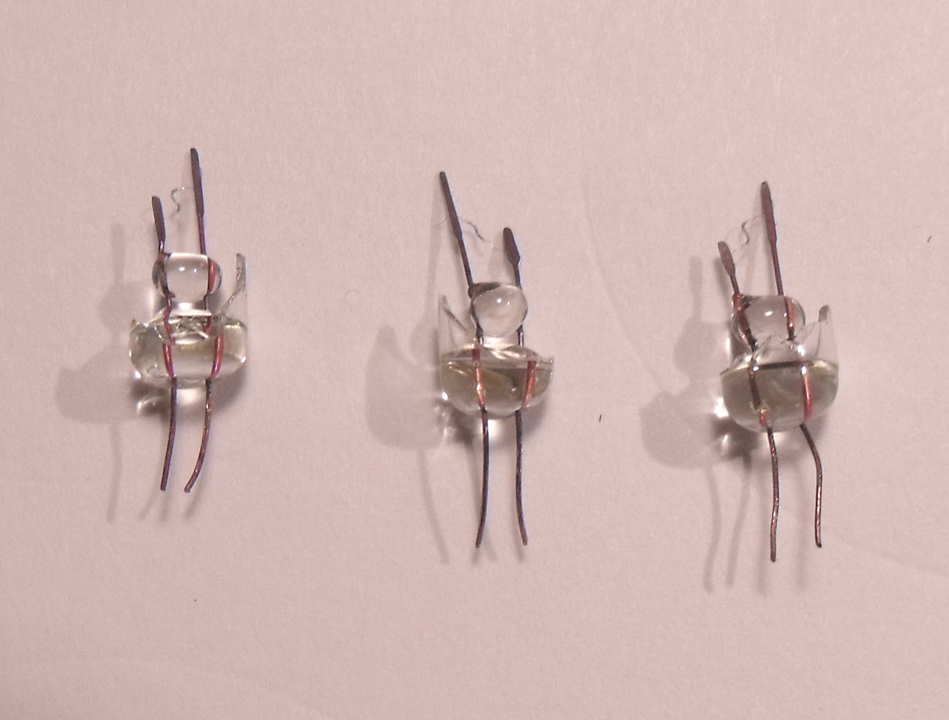 Photo of mini-bulb ready for attachment of electrical leads